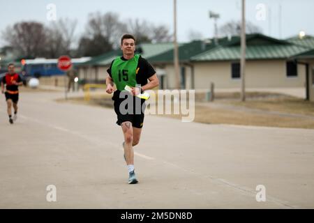 Spc. Kyle Combest, Oklahoma National Guard, climbs through an obstacle ...