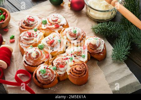 Christmas tree shape cinnamon rolls or cinnabon buns with cinnamon and ...