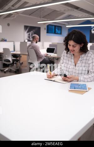 two employees work in the office Stock Photo - Alamy
