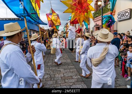 Farolero dancers representing lamplighters with their stylized lanterns ...