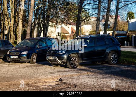 Reims, France - December 27, 2022 Various cars parked in the downtown ...