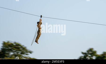A soldier travels on a zip-line as part of a confidence course on the ...