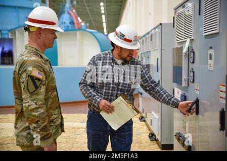 Daniel Kranz, Electrical Engineer, shows Col. Van Epps, NWD Commander ...