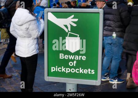 "Beware of pickpockets" sign in a public park, New York City, 2024 ...