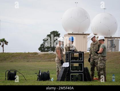 Col. Benjamin R. Jonsson, the 6th Air Refueling Wing commander, pins a ...