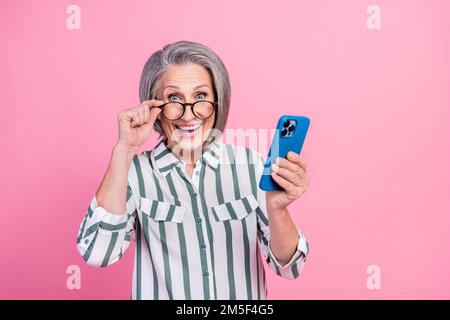 Photo of sweet funny lady wear white t-shirt typing modern device ...