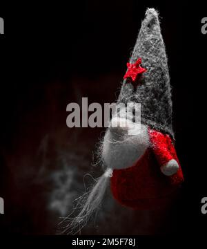 bearded elf with black background Stock Photo - Alamy