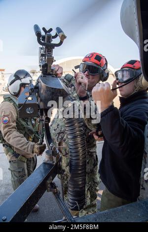 Aviation Ordnanceman 3rd Class William Bailey, Jr. transports MK-82 500 ...