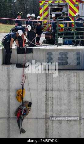 Arnold Air Force Base Fire and Emergency Services personnel look over ...