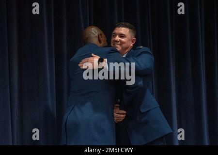 Maj. Gen. Ondra Berry congratulates Maj. Robert Kolvet during Kolvet's ...