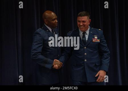 Maj. Gen. Ondra Berry congratulates Maj. Robert Kolvet during Kolvet's ...
