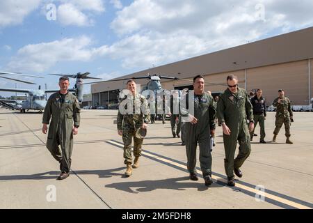 U.S. Navy Capt. Brannon Bickel, center, commodore, Helicopter Maritime ...