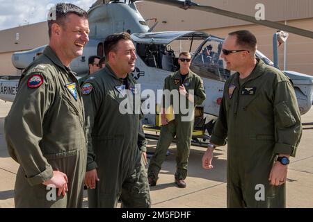 U.S. Navy Capt. Brannon Bickel, center, commodore, Helicopter Maritime ...
