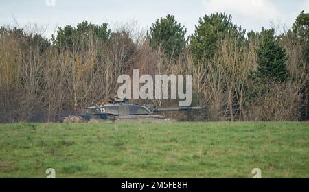 The military tanks moving in a field Stock Photo - Alamy