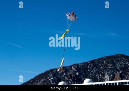 Model of a rocket on a parachute after flight Stock Photo - Alamy
