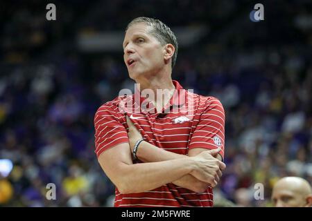Arkansas coach Eric Musselman talks with an official on the sidelines ...