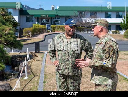 Capt. David Adams, Commander, Fleet Activities Sasebo bows after laying ...
