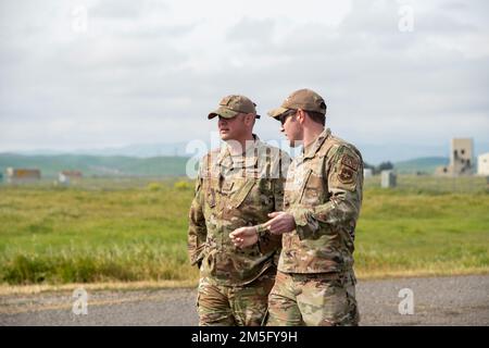 U.S. Air Force Col. Corey Simmons, left, 60th Air Mobility Wing ...