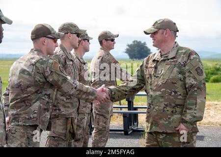 U.S. Air Force Col. Corey Simmons, center, 60th Air Mobility Wing ...