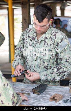 Seabees assigned to Amphibious Construction Battalion One (ACB-1) raise ...