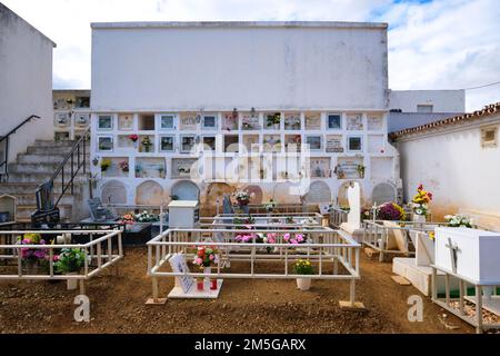 Various decorated tombs in a Catholic, christian cemetery. In the town ...