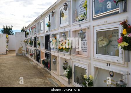 Various decorated tombs in a Catholic, christian cemetery. In the town ...