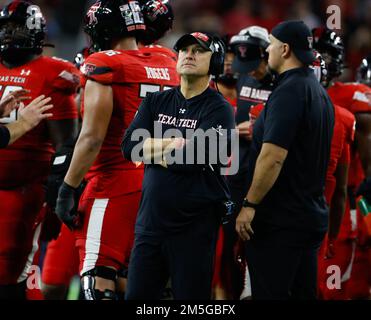 Texas Tech head coach Joey McGuire, left, meets Arkansas head coach Sam ...