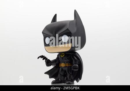Batman 1989 vinyl figure with Batarang and Batsignal isolated on white ...