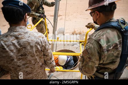 Royal Saudi Air Force service members assemble an American Joint Direct ...