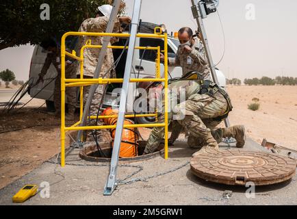 Royal Saudi Air Force service members assemble an American Joint Direct ...