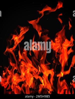 Fire in a Stone Firepit at Night in Summer Stock Photo - Alamy