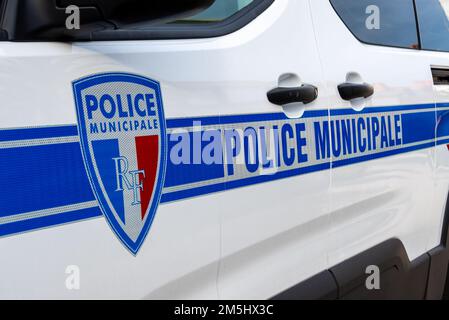 Close-up 'POLICE' marking written on the back of a bulletproof vest ...