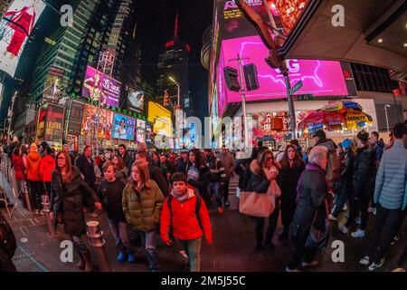 Thousands of visitors descend on Times Square in New York on Wednesday ...