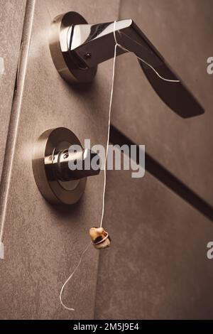 Real human teeth hanging on the door handle. Pulled out tooth ...