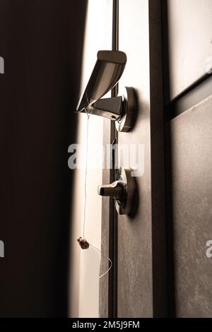 Real human teeth hanging on the door handle. Pulled out tooth ...