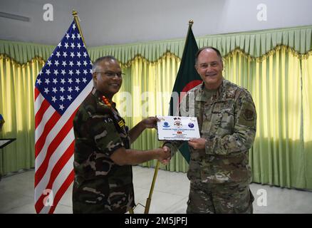 Maj. Gen. Michael Stencel, Adjutant General, Oregon (right), signs the ...