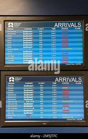An arrivals flight information monitor with on-time, delayed and ...