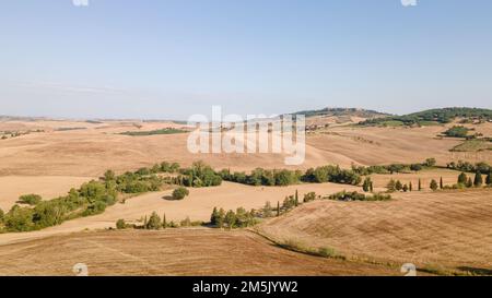 An aerial view of the Tuscany fields located in Italy seen on a ...