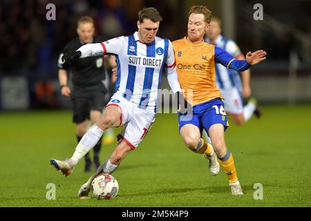 Hartlepool United's Callum Cooke looks to win the midfield battle ...