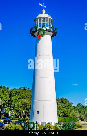 The Biloxi Lighthouse is decorated for Christmas in front of the Biloxi ...