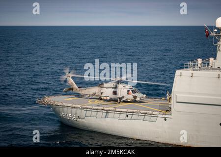 Danish MH-60R Seahawk helicopter flying from the Greenland Patrol Ship ...