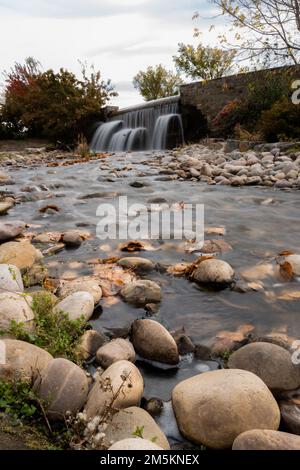 A beautiful shot of a streaming rocky river in the woods Stock Photo ...