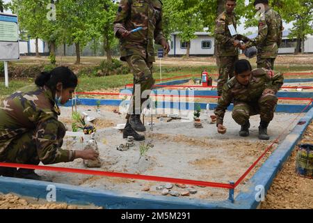 Bangladeshi soldiers construct scenario models in the cordoned off ...