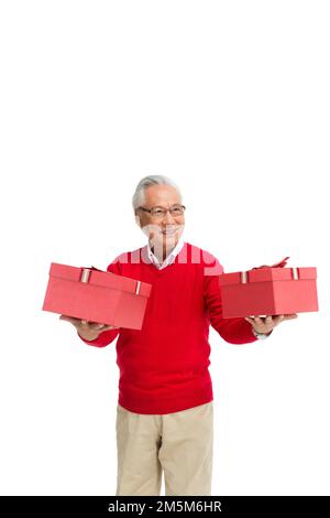 Shed older men with gift box Stock Photo - Alamy