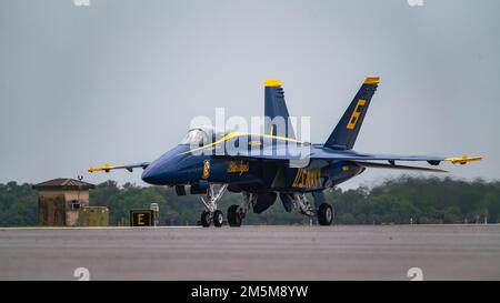 U.S. Navy Lt. Cmdr. Julius Bratton, a Blue Angels pilot, climbs into ...