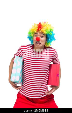 Shed film happy funny clown, gift box Stock Photo - Alamy