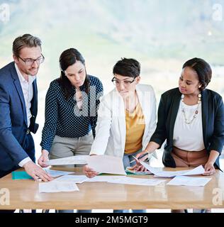 Everything seems to be in order. a confident mature male doctor ...