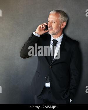 What it means to be white collar. a handsome mature businessman in ...