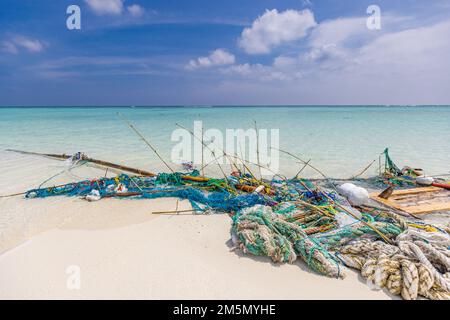 The problem of trash on the beach caused by man made pollution ...