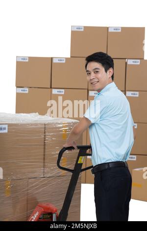 Trolley freight logistics warehouse staff Stock Photo - Alamy